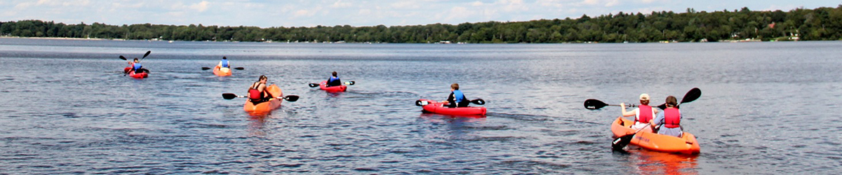 Sharon_Lake Massapoag kayakers_1200x250 - MassPowerChoice.com